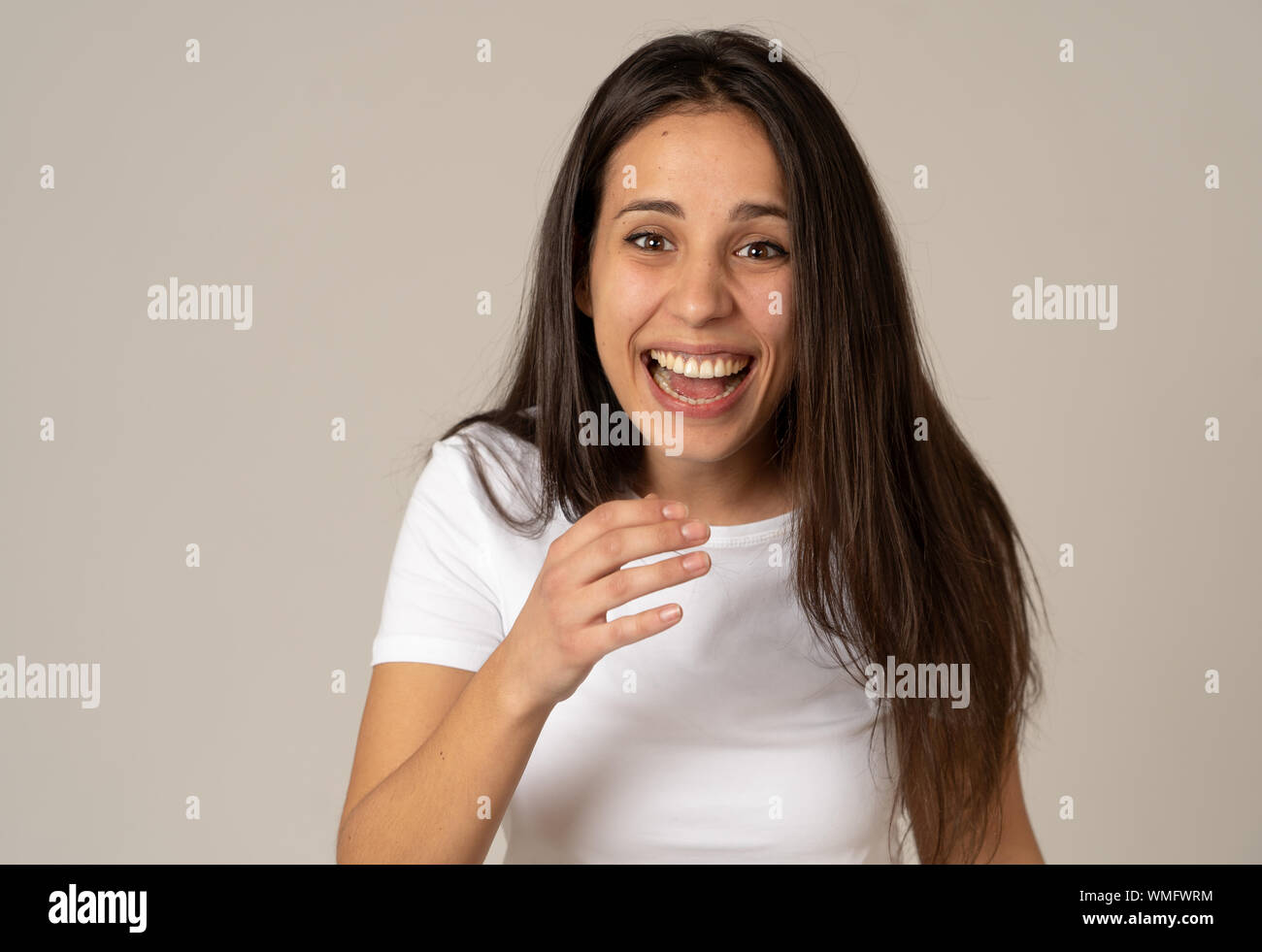 Portrait of beautiful shocked woman hearing good news or having great ...