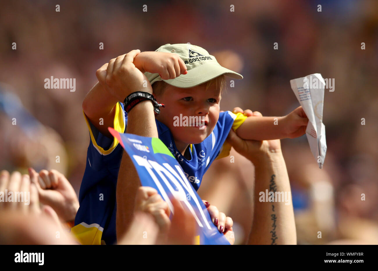 A young Warrington Wolves fan in the stands Stock Photo - Alamy
