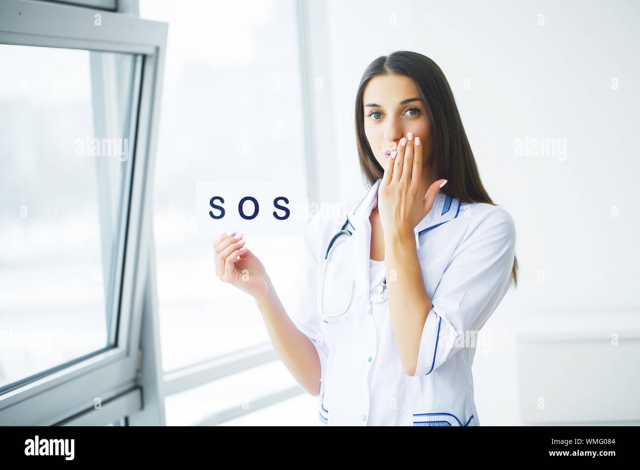 Health Care. Doctor Holding a Card With Symbol HELP, Medical Concept ...