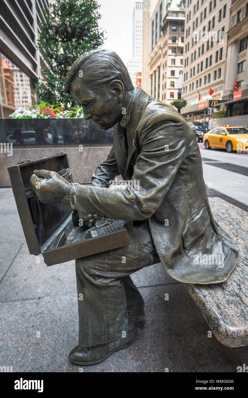 Double Check sculpture, view of a bronze figure of a businessman sited ...