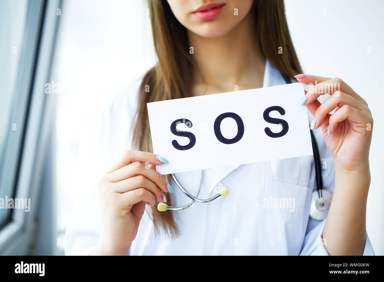 Health Care. Doctor Holding a Card With Symbol HELP, Medical Concept ...