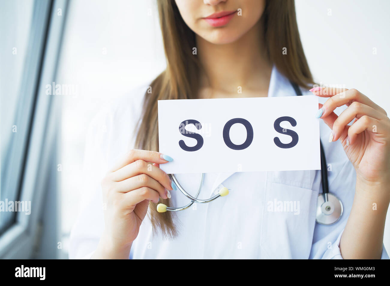 Health Care. Doctor Holding a Card With Symbol HELP, Medical Concept ...