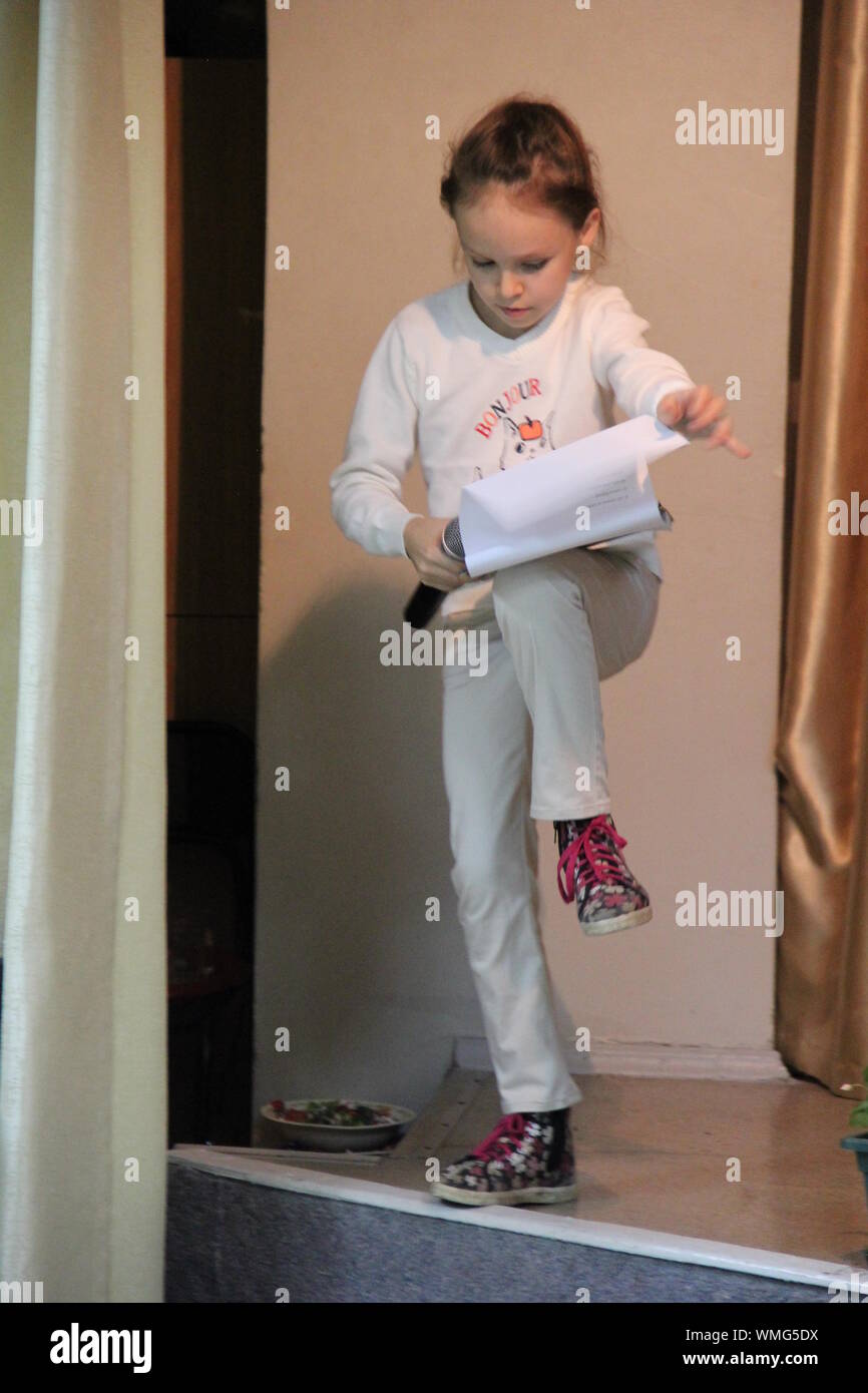 Girl on stage microphone hi-res stock photography and images - Alamy