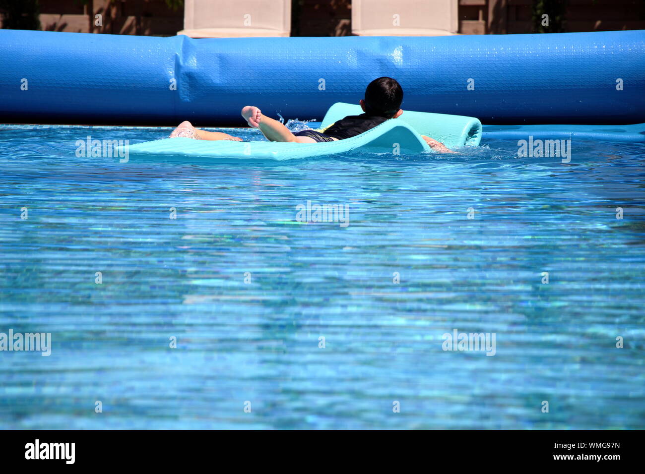 Boys Lying Pool High Resolution Stock Photography and Images - Alamy