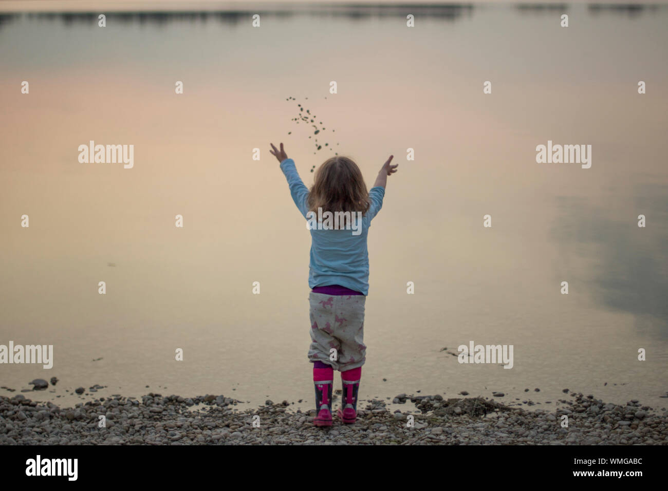 Throwing Stones Into Water High Resolution Stock Photography and Images ...