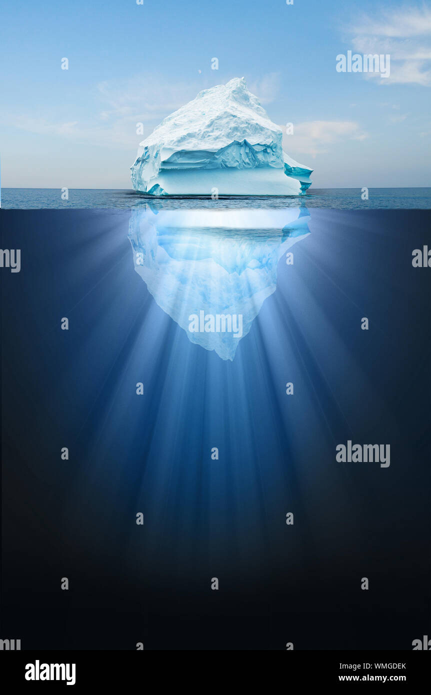 Iceberg floating in the ocean, both the tip and the submerged parts are ...