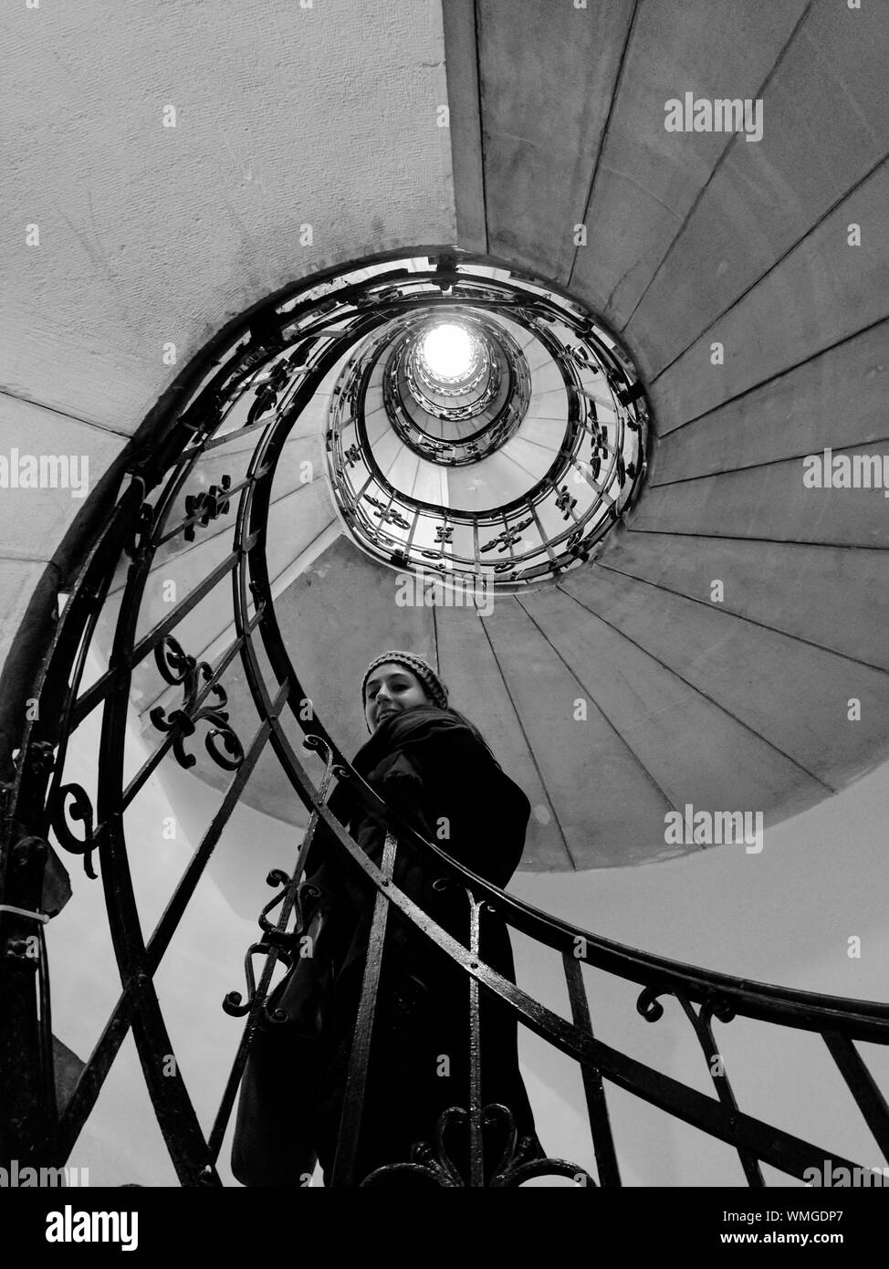 Walking up spiral staircase hi-res stock photography and images - Alamy