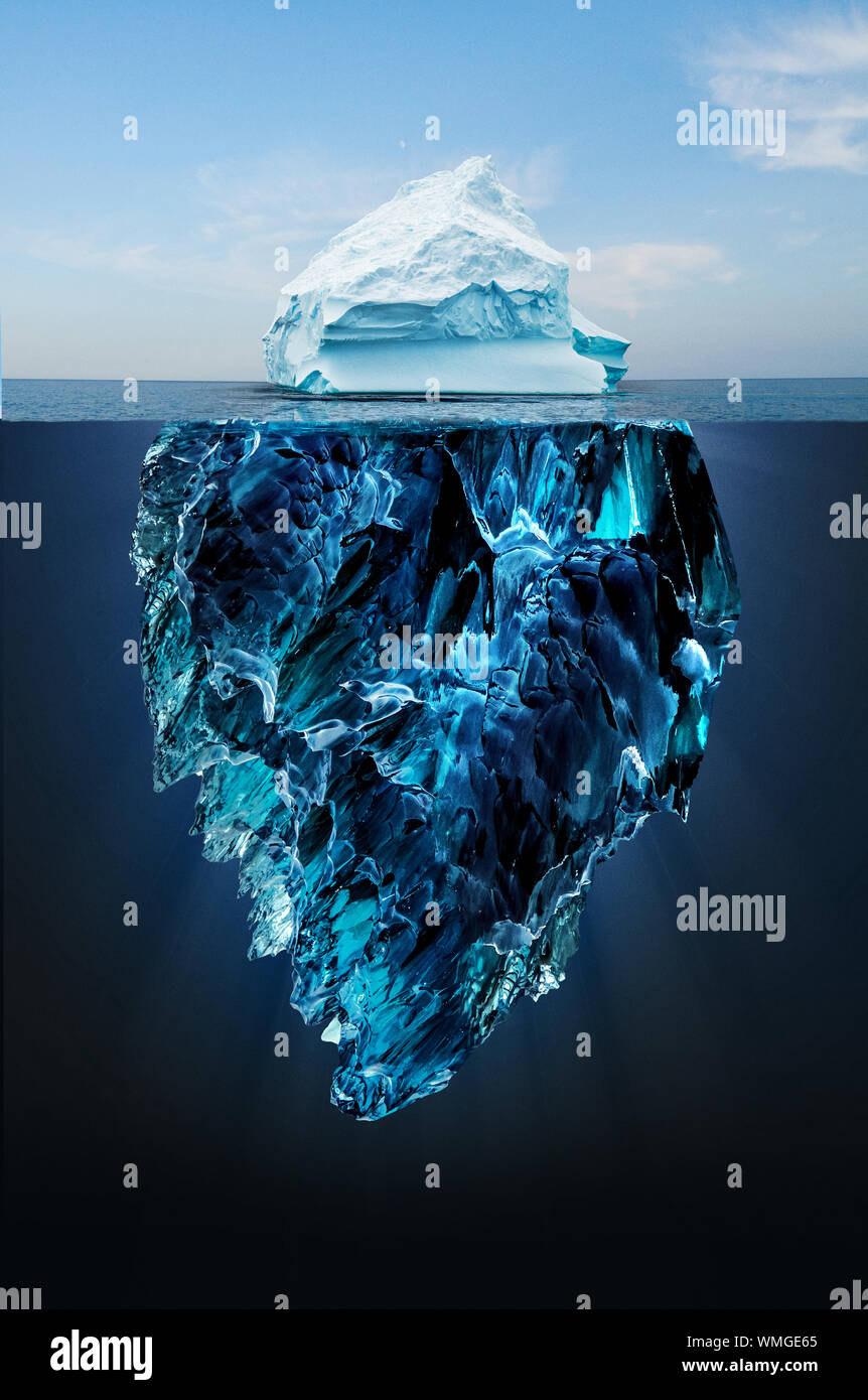 Iceberg floating in the ocean, both the tip and the submerged parts are ...