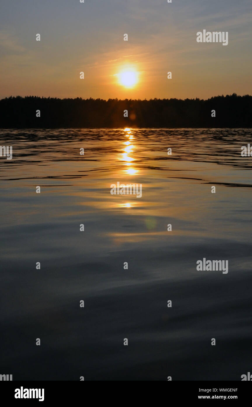 Sunset orange lake water reflection landscape. Sunset water reflection ...