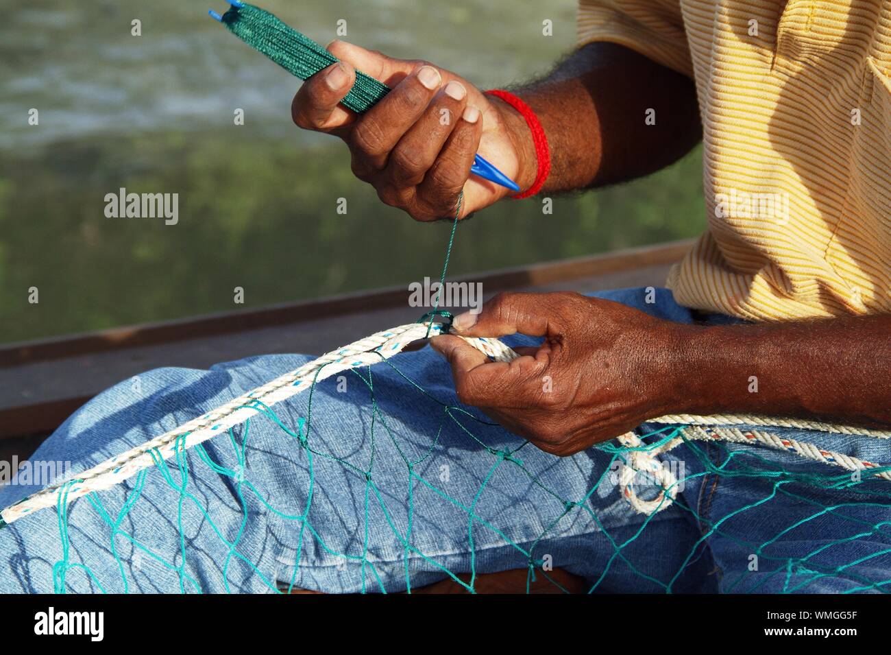 Man stitching hi-res stock photography and images - Alamy