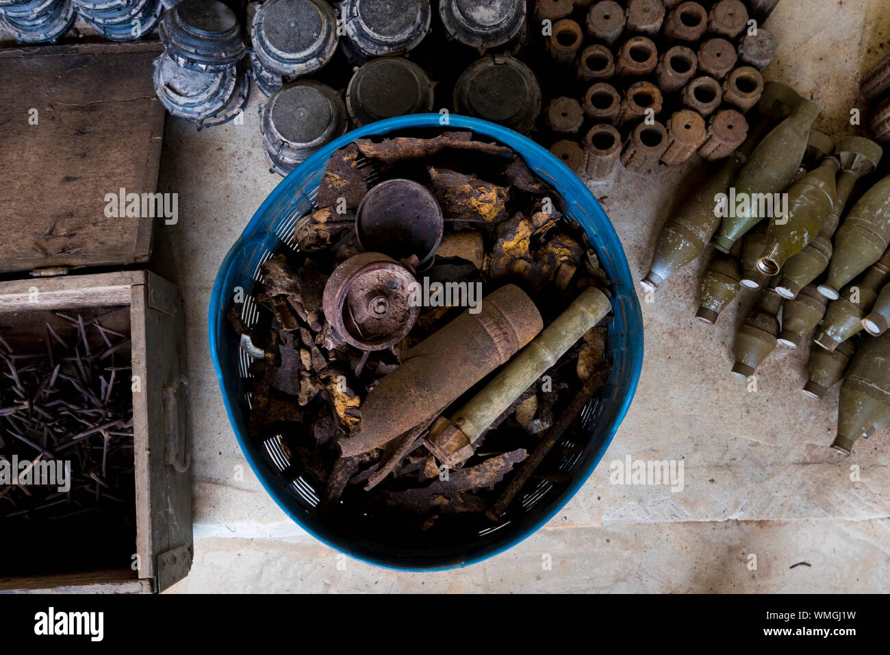 A bucket of recovered landmines at the Landmine museum in Siem Reap ...
