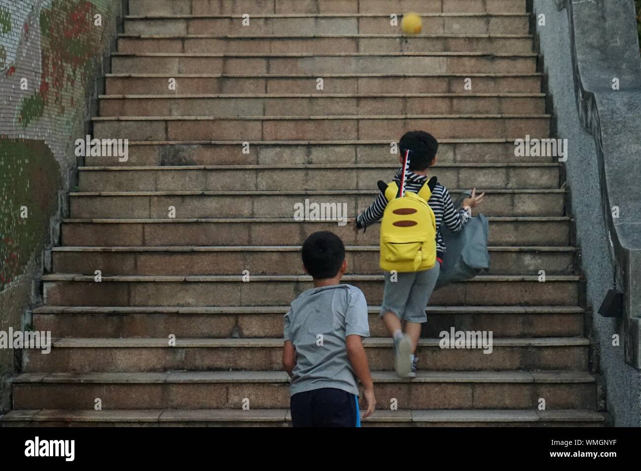 Two boys climbing hi-res stock photography and images - Alamy