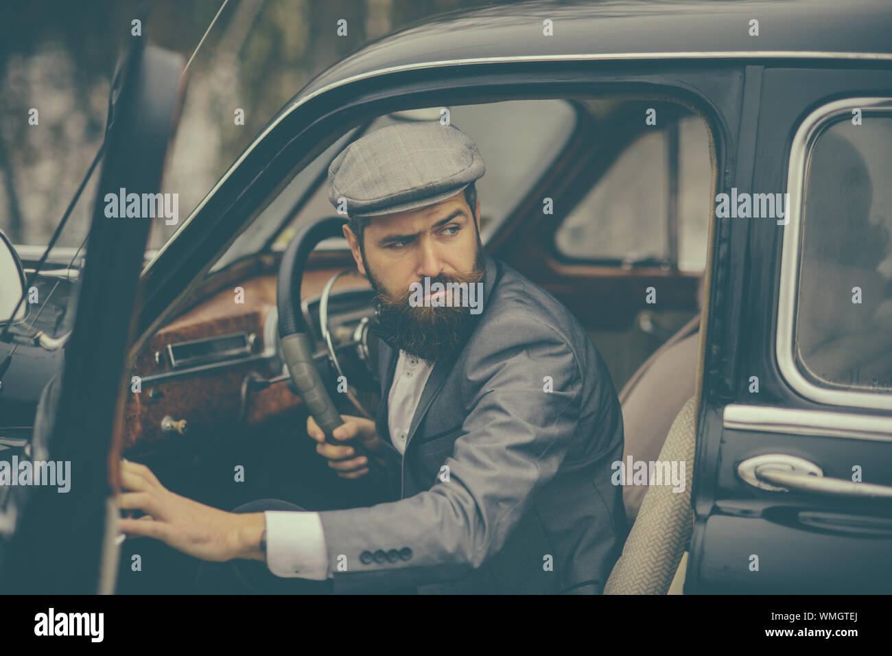 Escort man or security guard. escort service of bearded man in retro ...