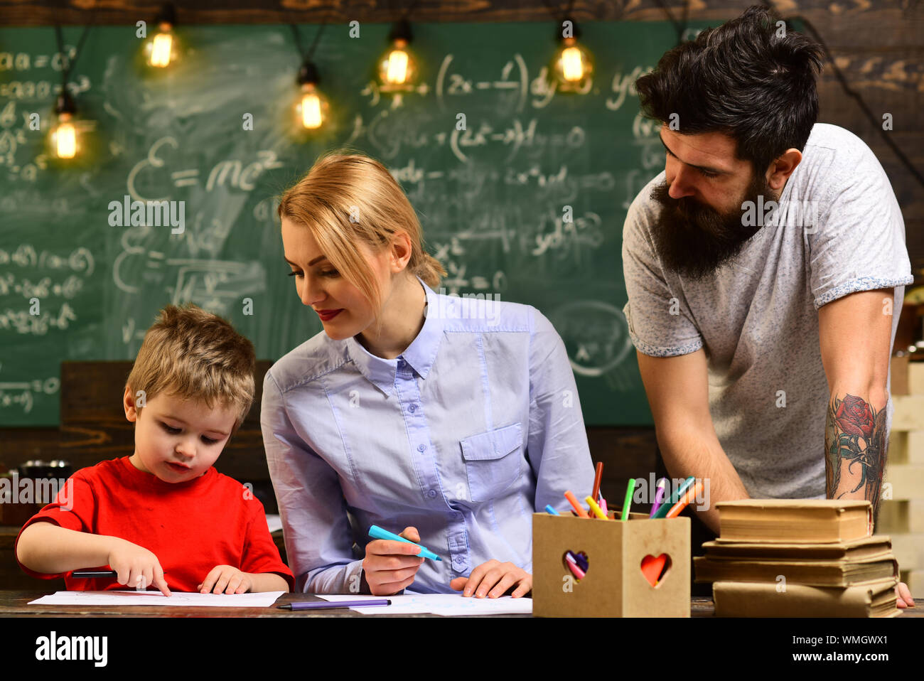 Business tutor typing on laptop at workplace in classroom, Teacher ...