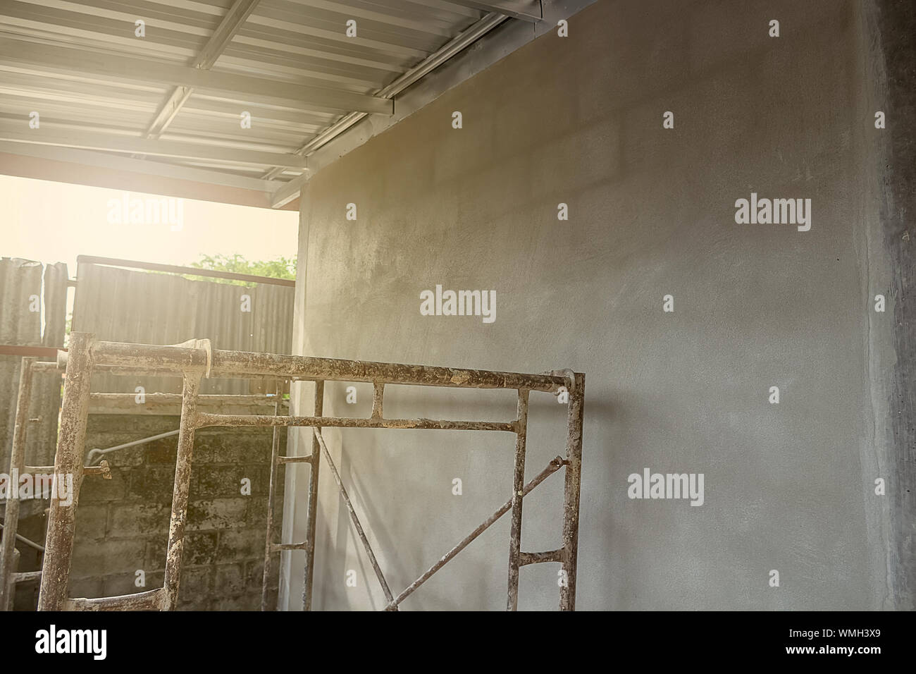 Scaffolding iron concrete wall in construct site at morning Stock Photo ...
