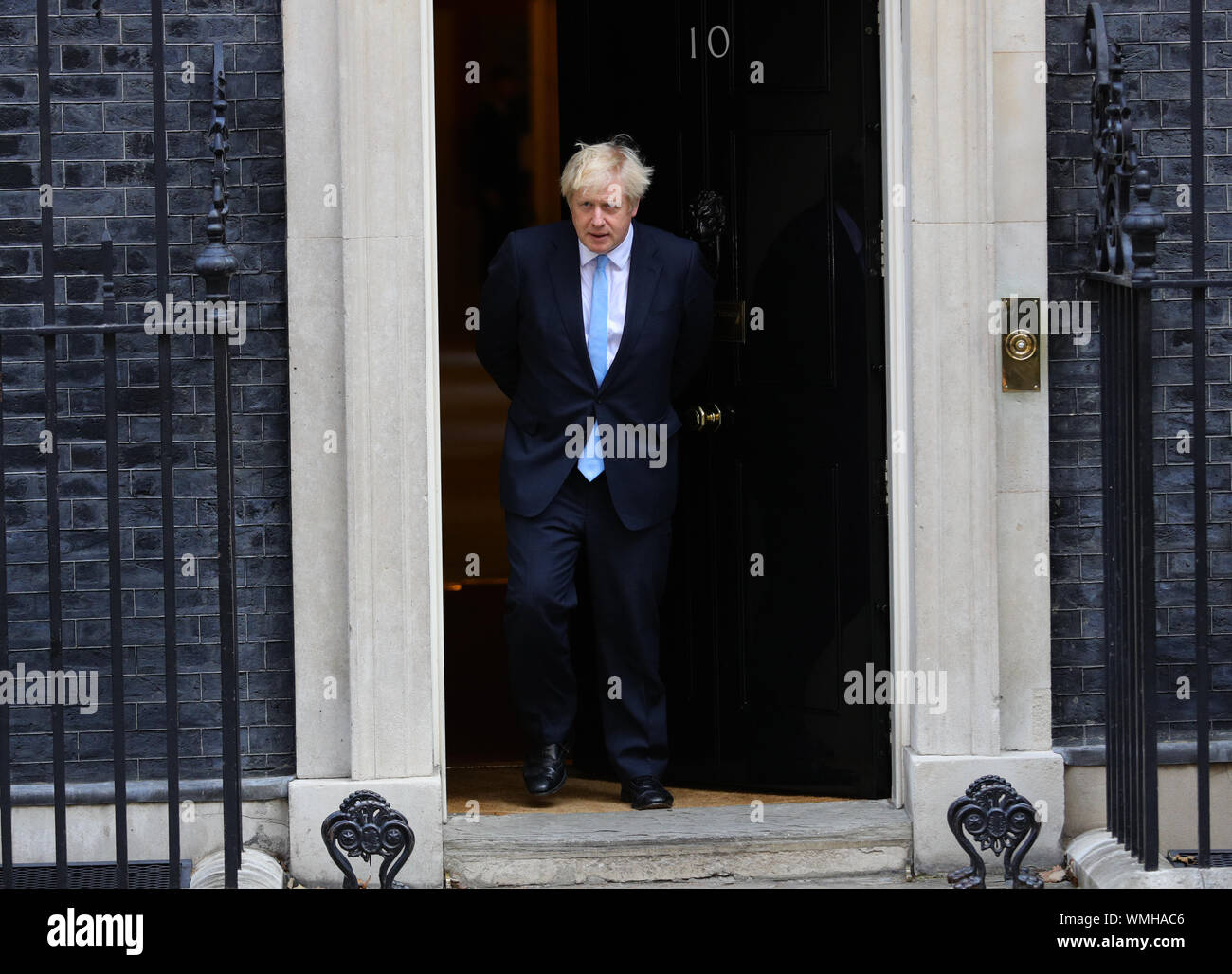 Prime Minister Boris Johnson waits to greet the Prime Minister of ...