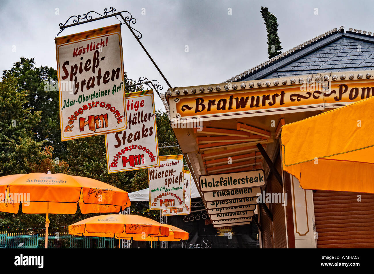 Signs and banners with the offer of food at a closed snack bar Stock ...