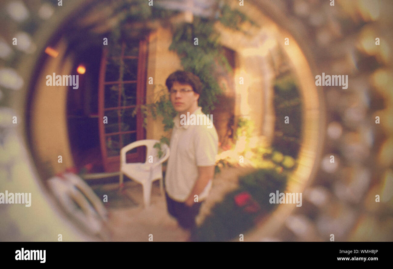Man Peephole High Resolution Stock Photography and Images - Alamy