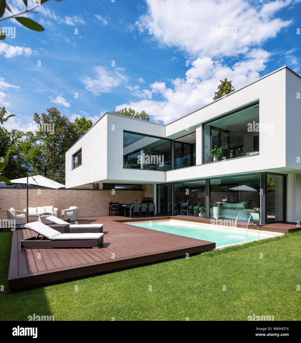 Exterior modern white villa with pool and garden, nobody inside Stock ...