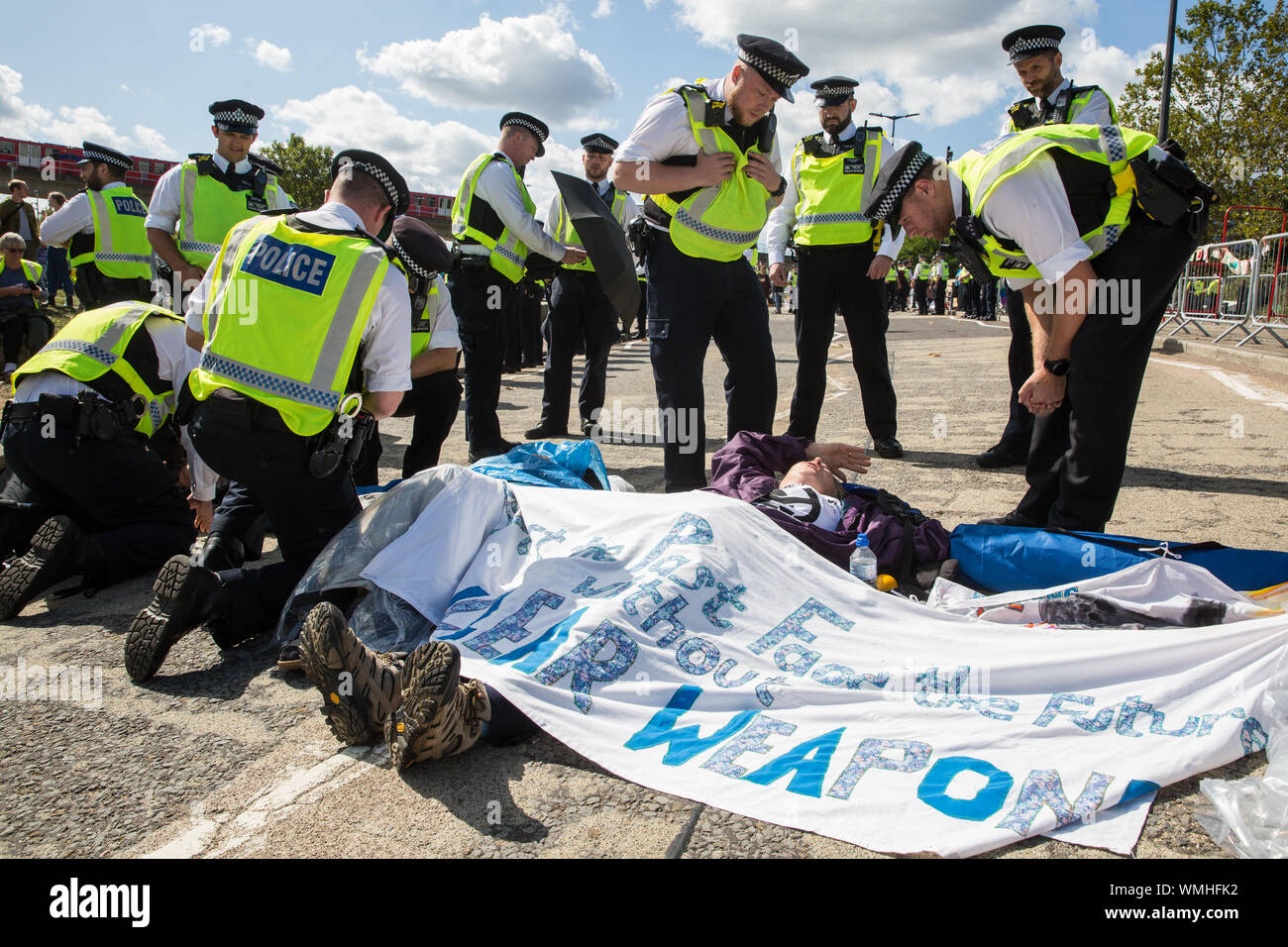 Demonstrators arm in arm block hi-res stock photography and images - Alamy