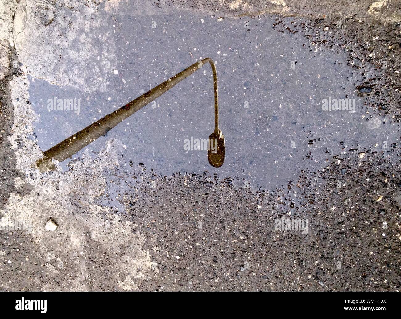 Puddle light reflection street hi-res stock photography and images - Alamy
