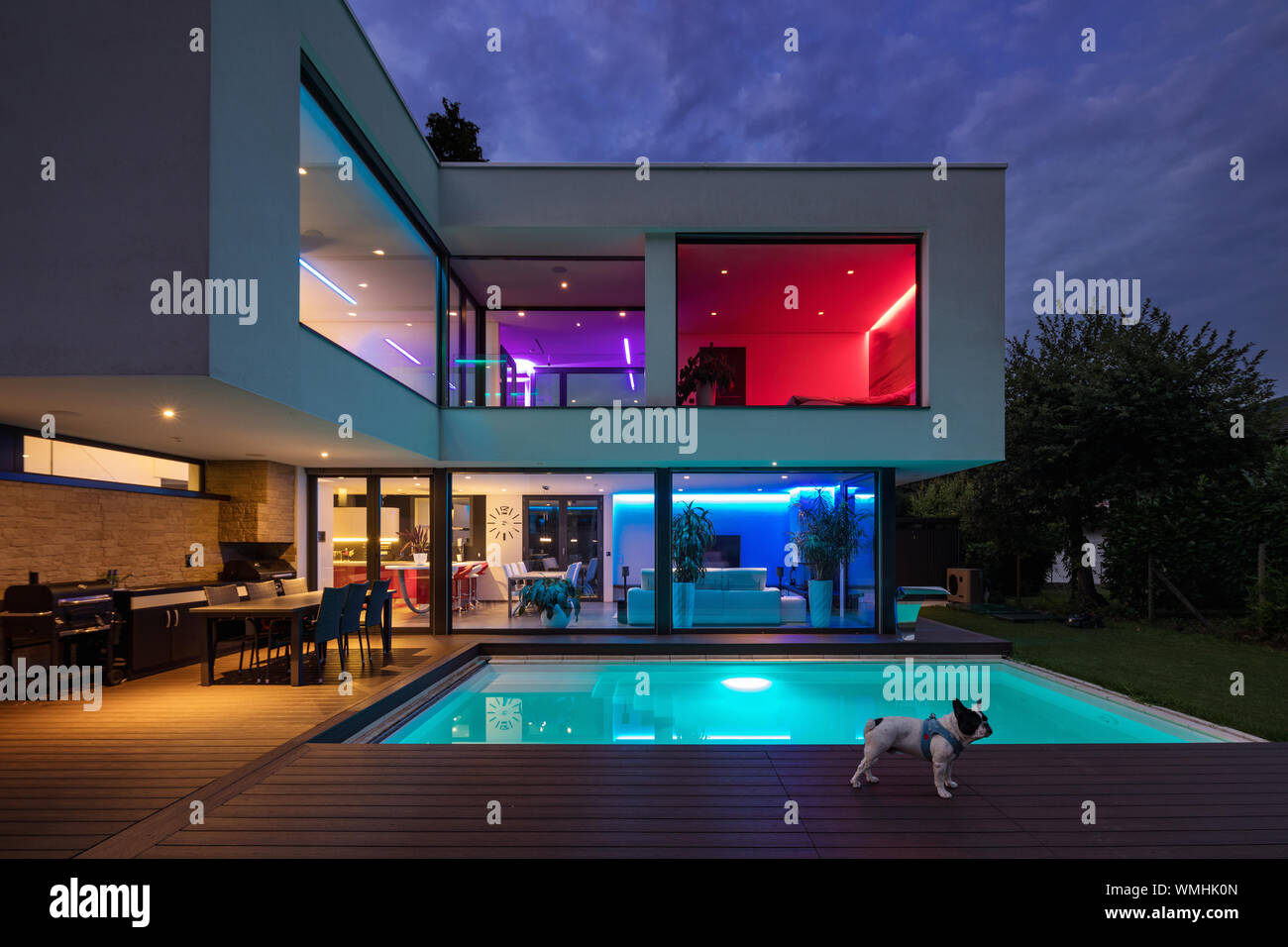 Modern villa with colored led lights at night. Nobody inside Stock ...