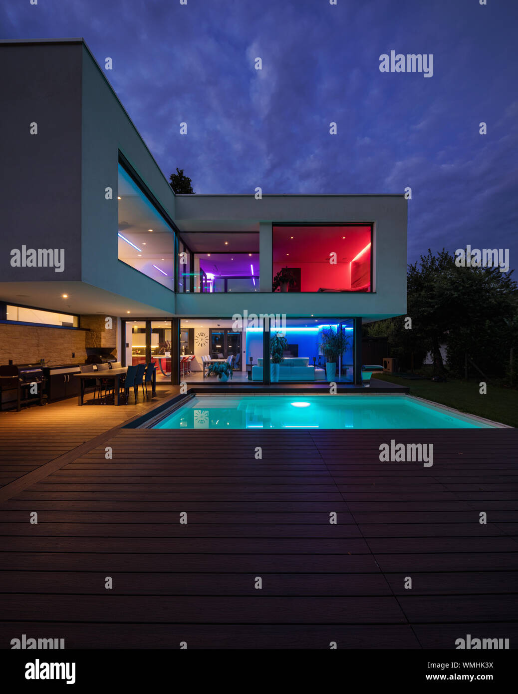 Modern villa with colored led lights at night. Nobody inside Stock ...