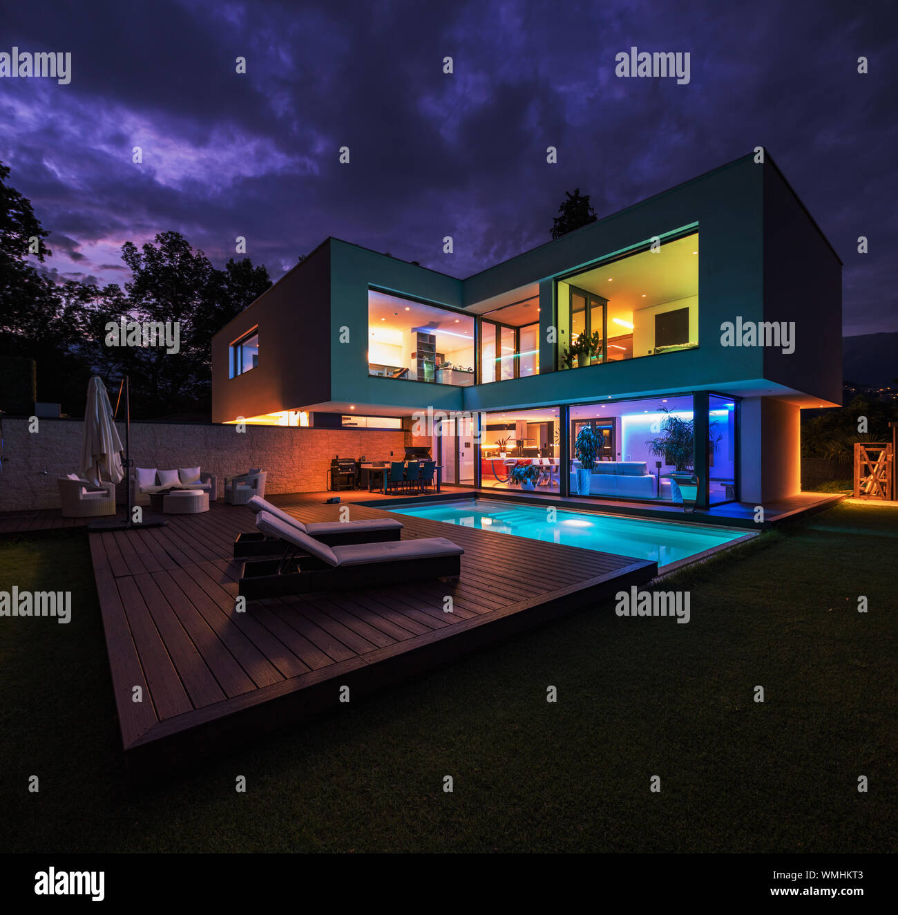 Modern villa with colored led lights at night. Nobody inside Stock ...