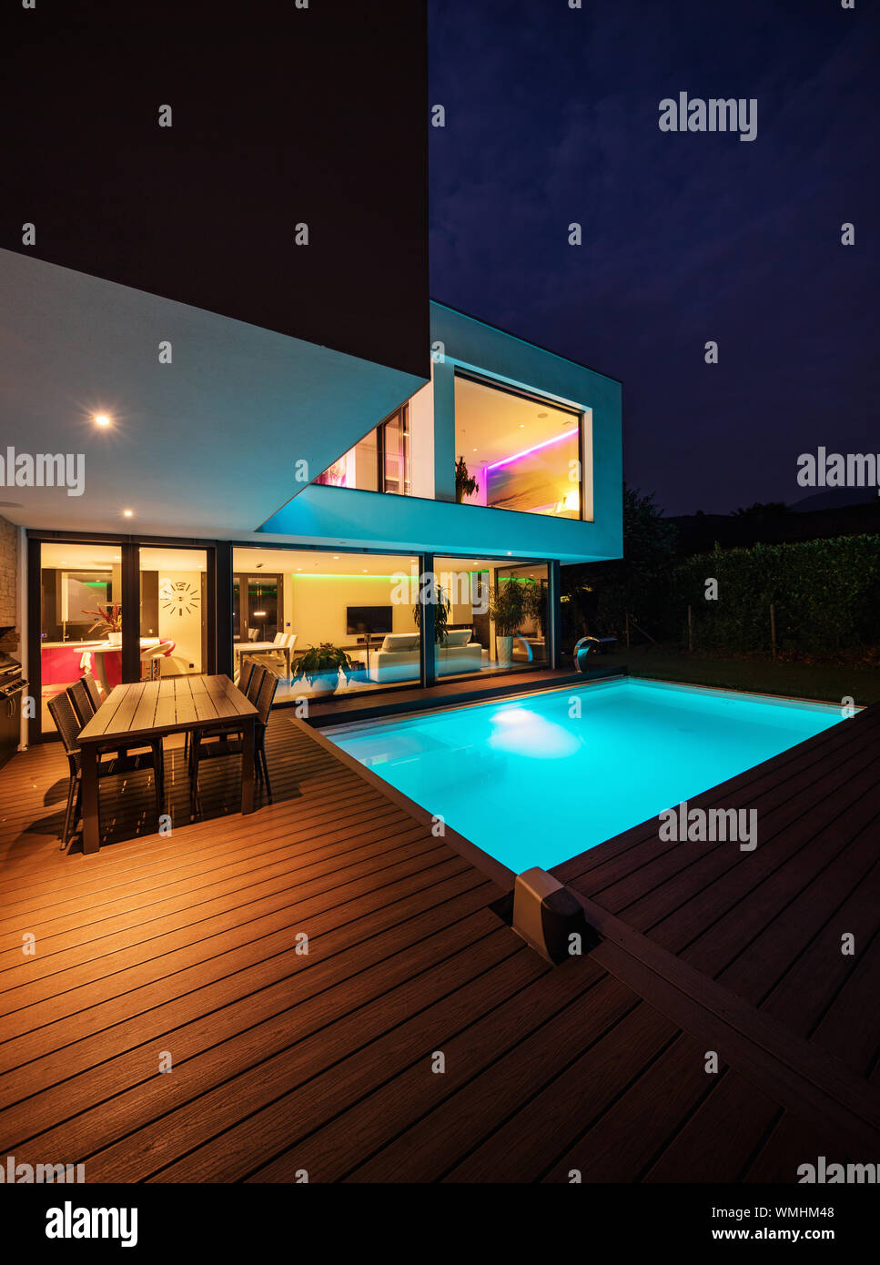Modern villa with colored led lights at night. Nobody inside Stock ...