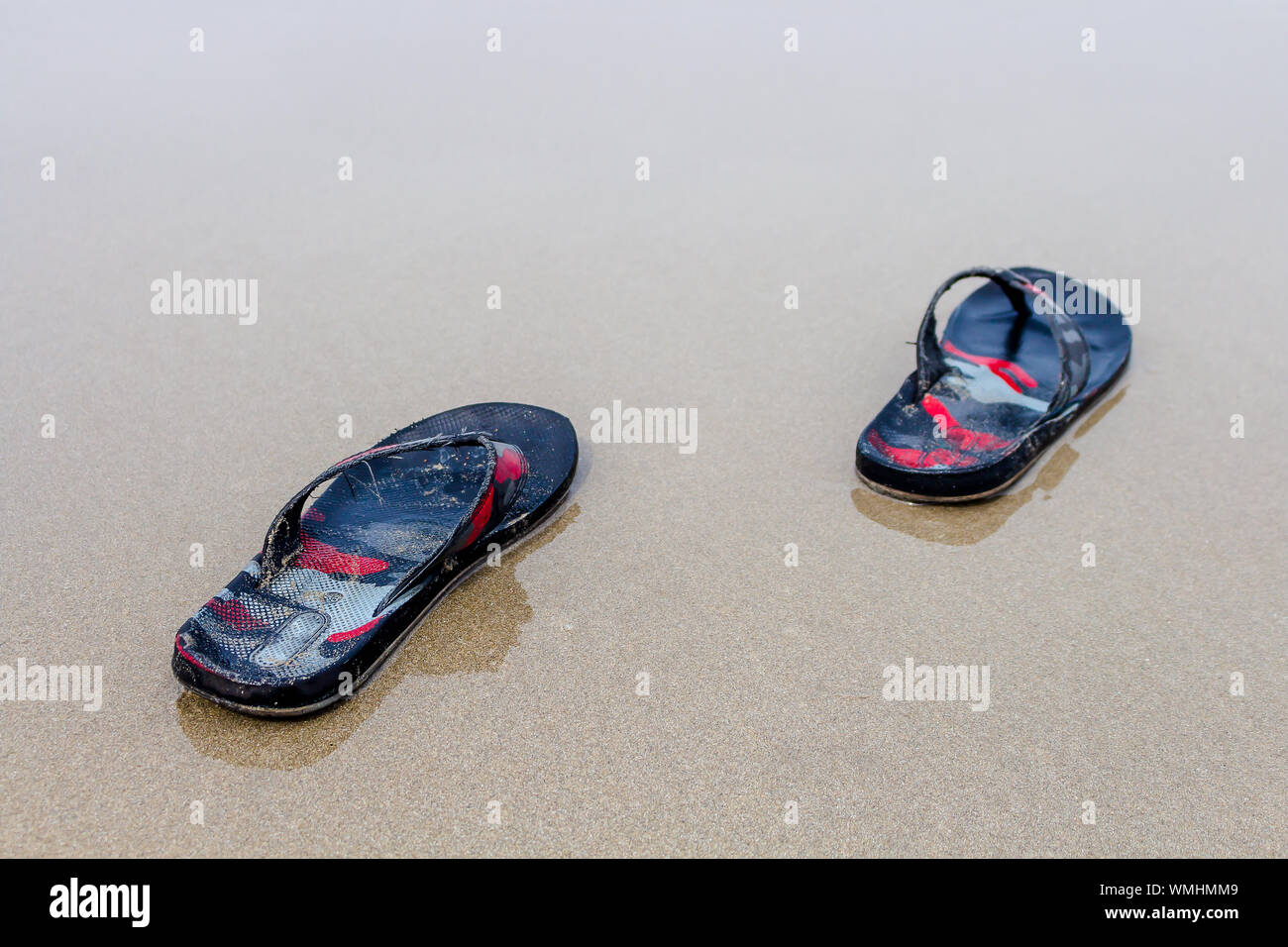 Take off the shoes to swimming sea in the relax holiday Stock Photo - Alamy