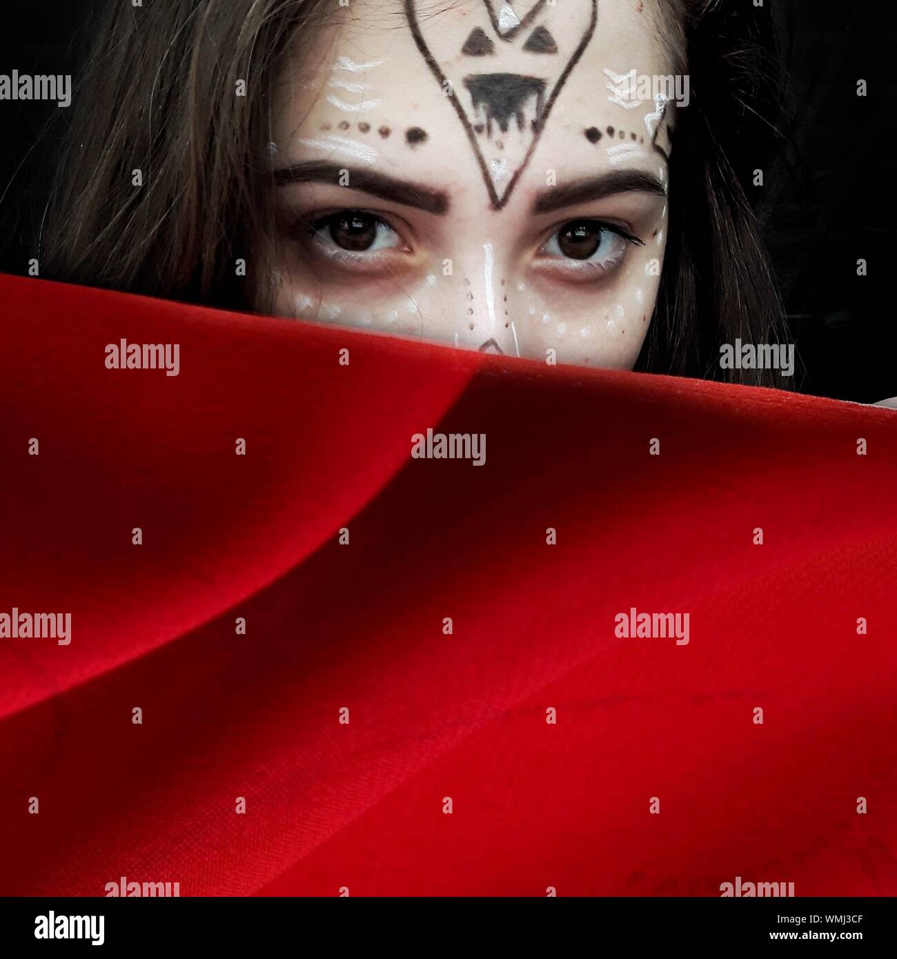 Woman Face Paint Red High Resolution Stock Photography and Images - Alamy