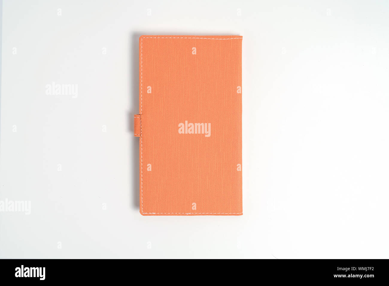 top view blank orange leather diary on white desk Stock Photo - Alamy