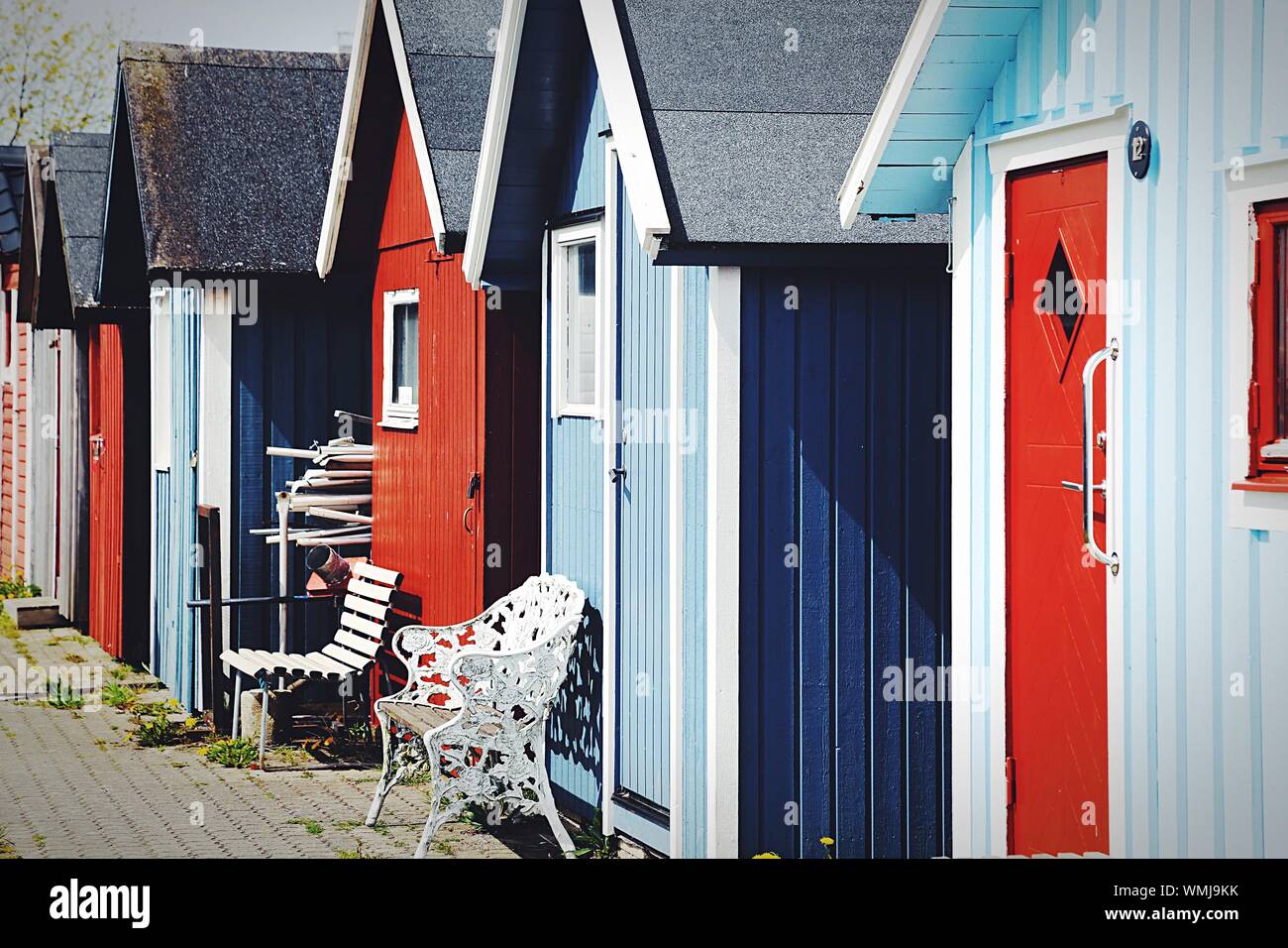 Multi Colored Huts By Street Stock Photo - Alamy