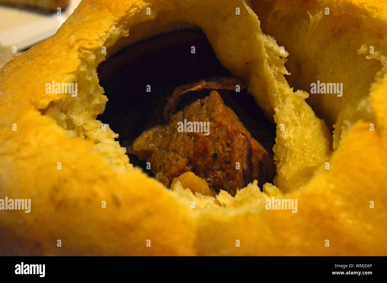 Country style oven baked meat Stock Photo - Alamy