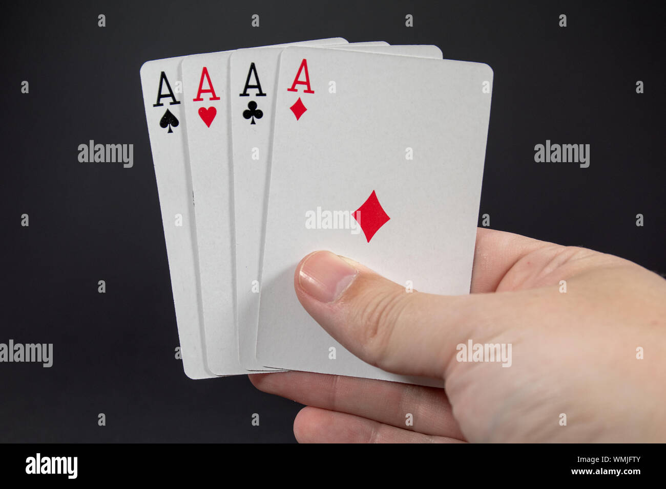 Playing cards ace hand hi-res stock photography and images - Alamy