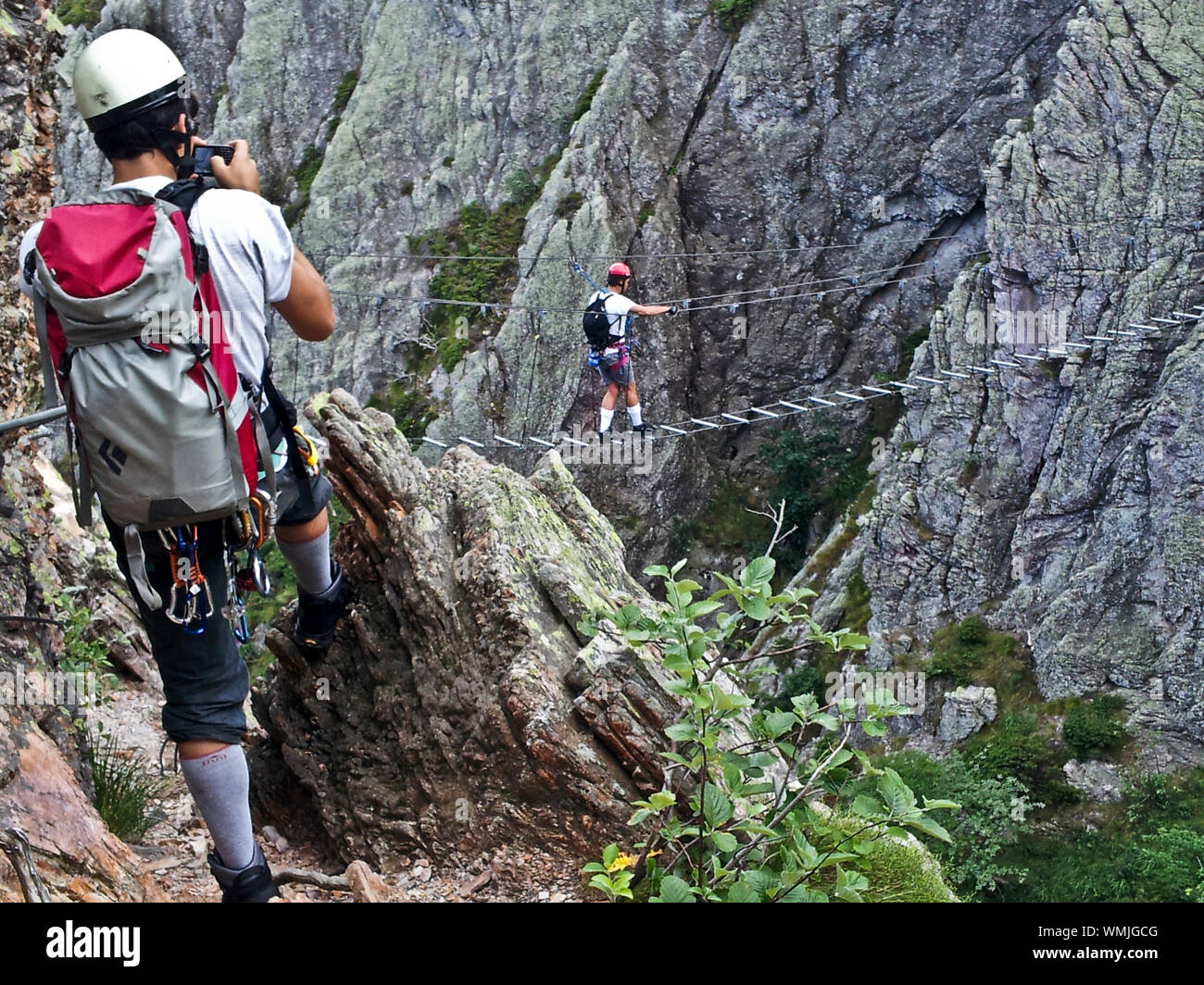 Narrow rope bridge hi-res stock photography and images - Alamy