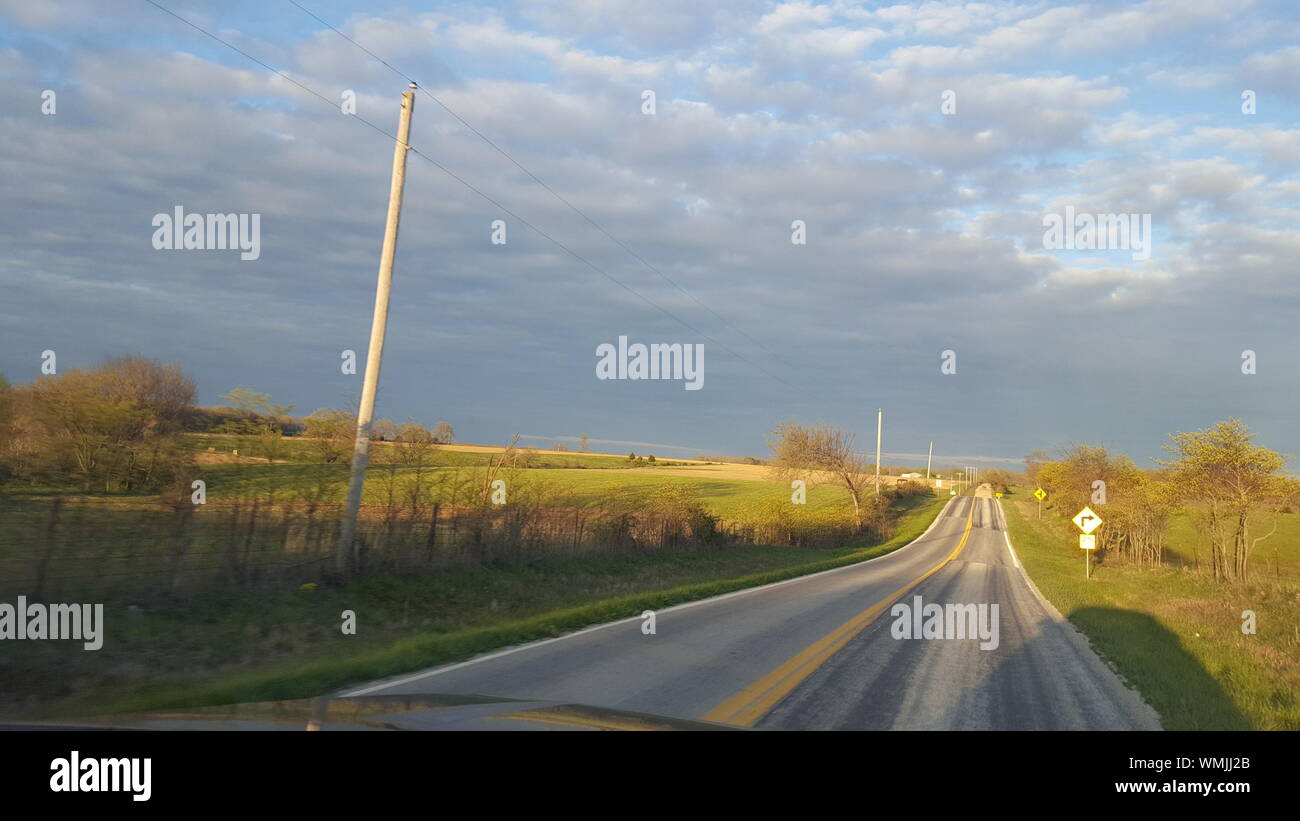 Car passing through country road hi-res stock photography and images ...