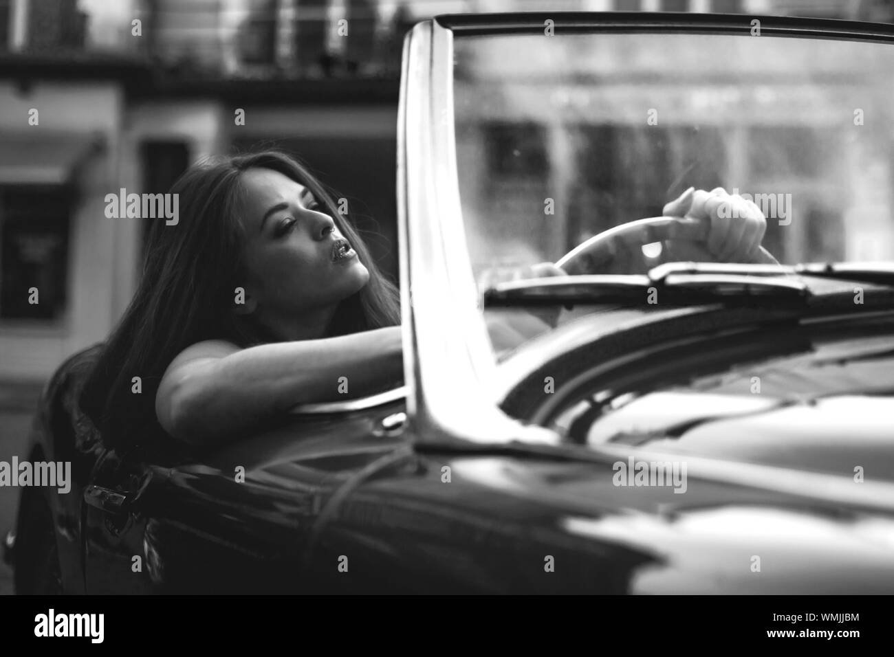 Person driving car Black and White Stock Photos & Images - Alamy