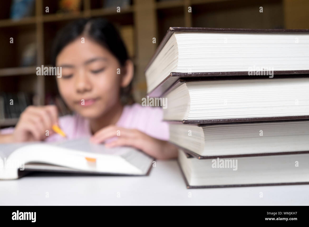 Girl Studying In Library High Resolution Stock Photography and Images ...