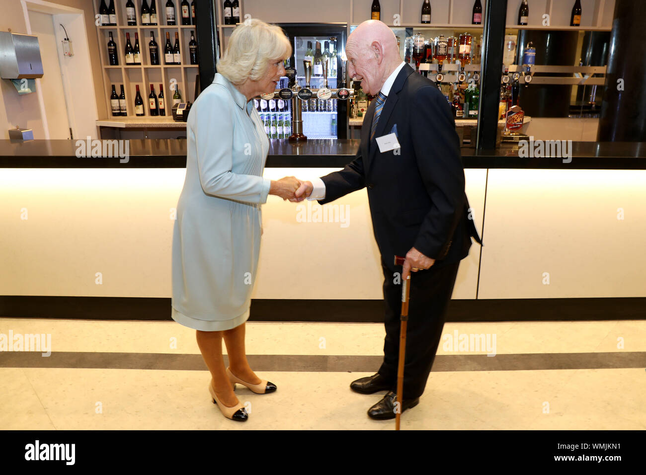 The Duchess of Cornwall greets Bryan Allen during a celebratory tea ...