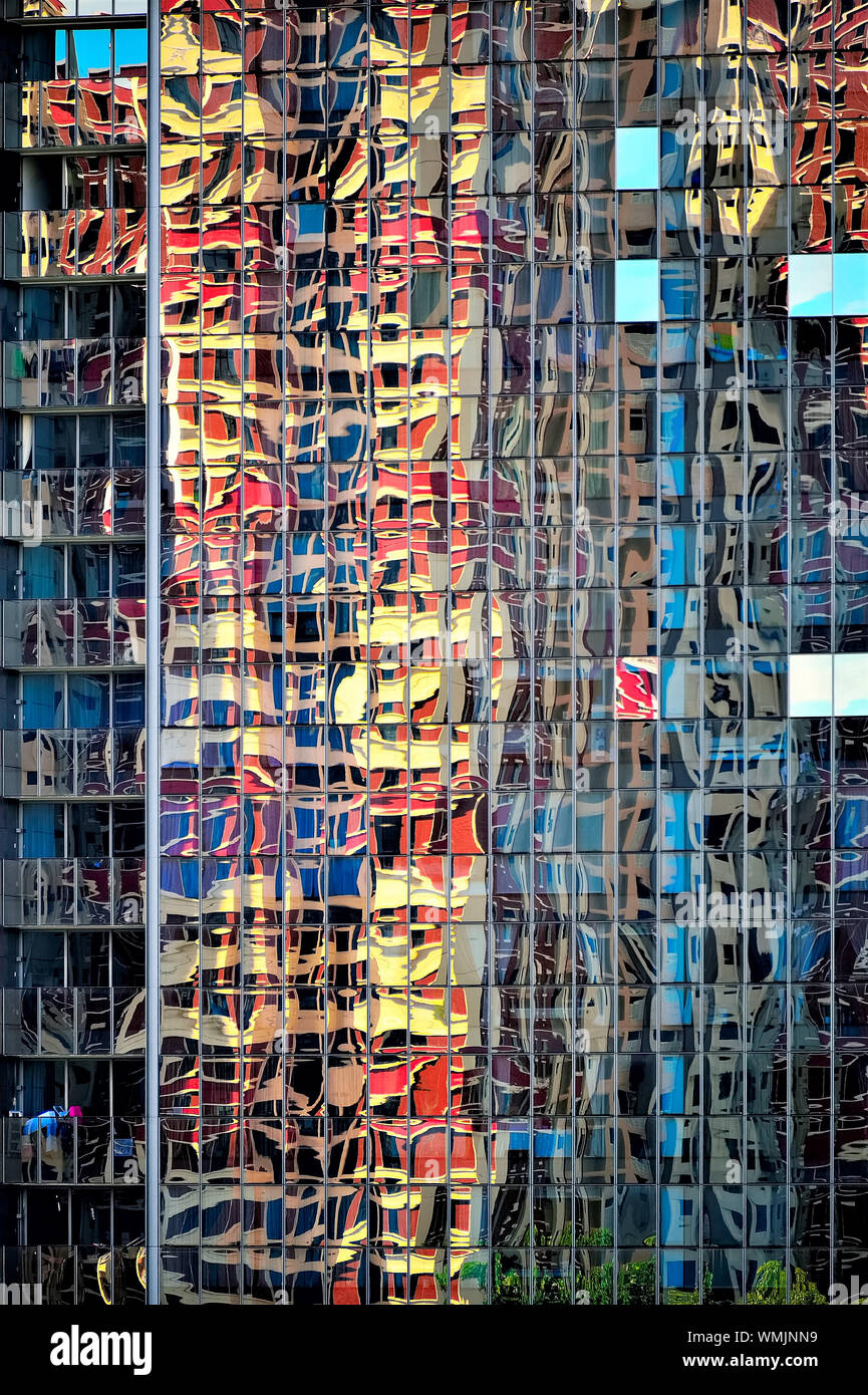 Modern office building in Singapore with glass exterior and strong ...