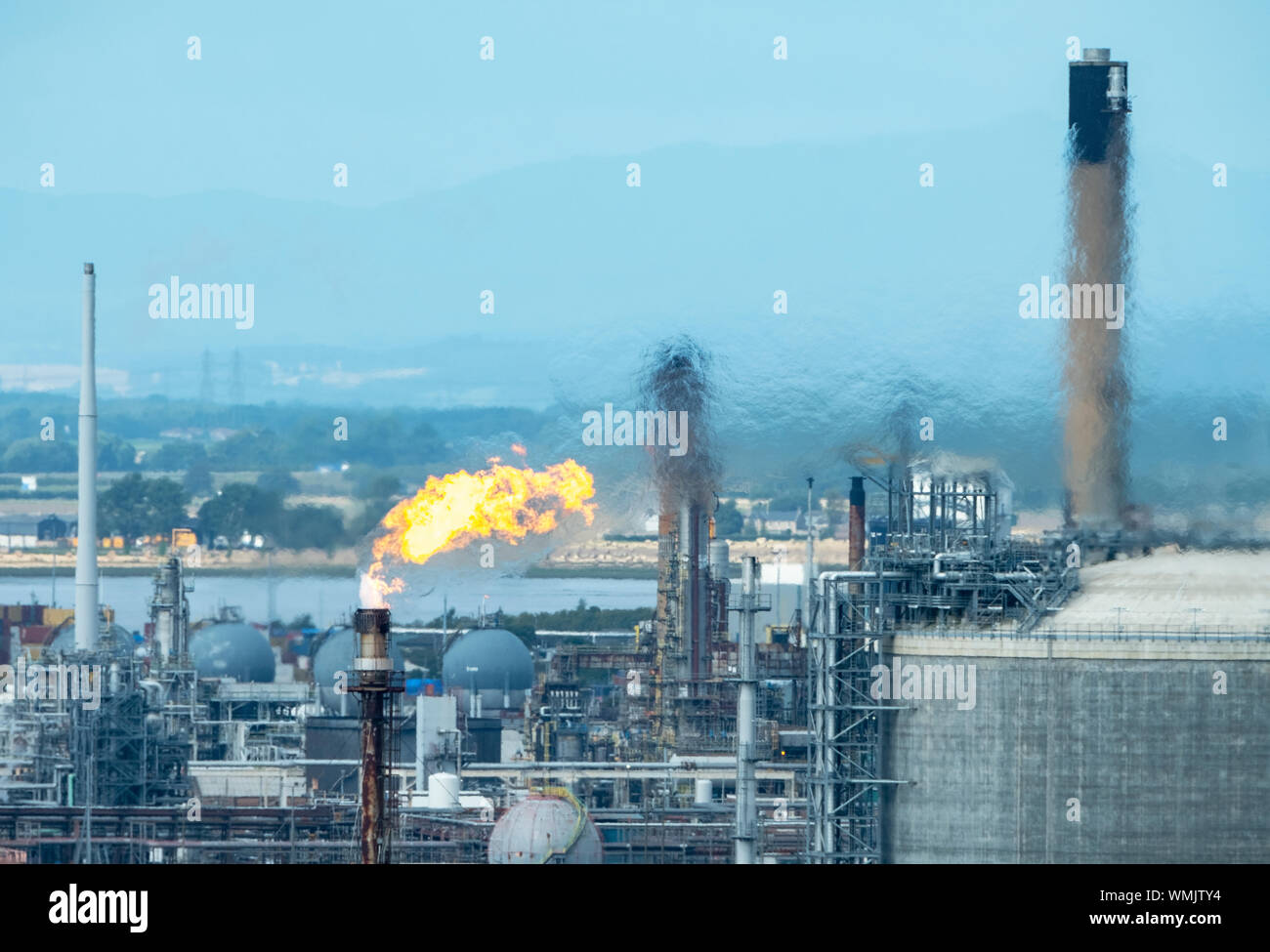 Gas flare stack burning at the Grangemouth oil refinery, Scotland Stock ...