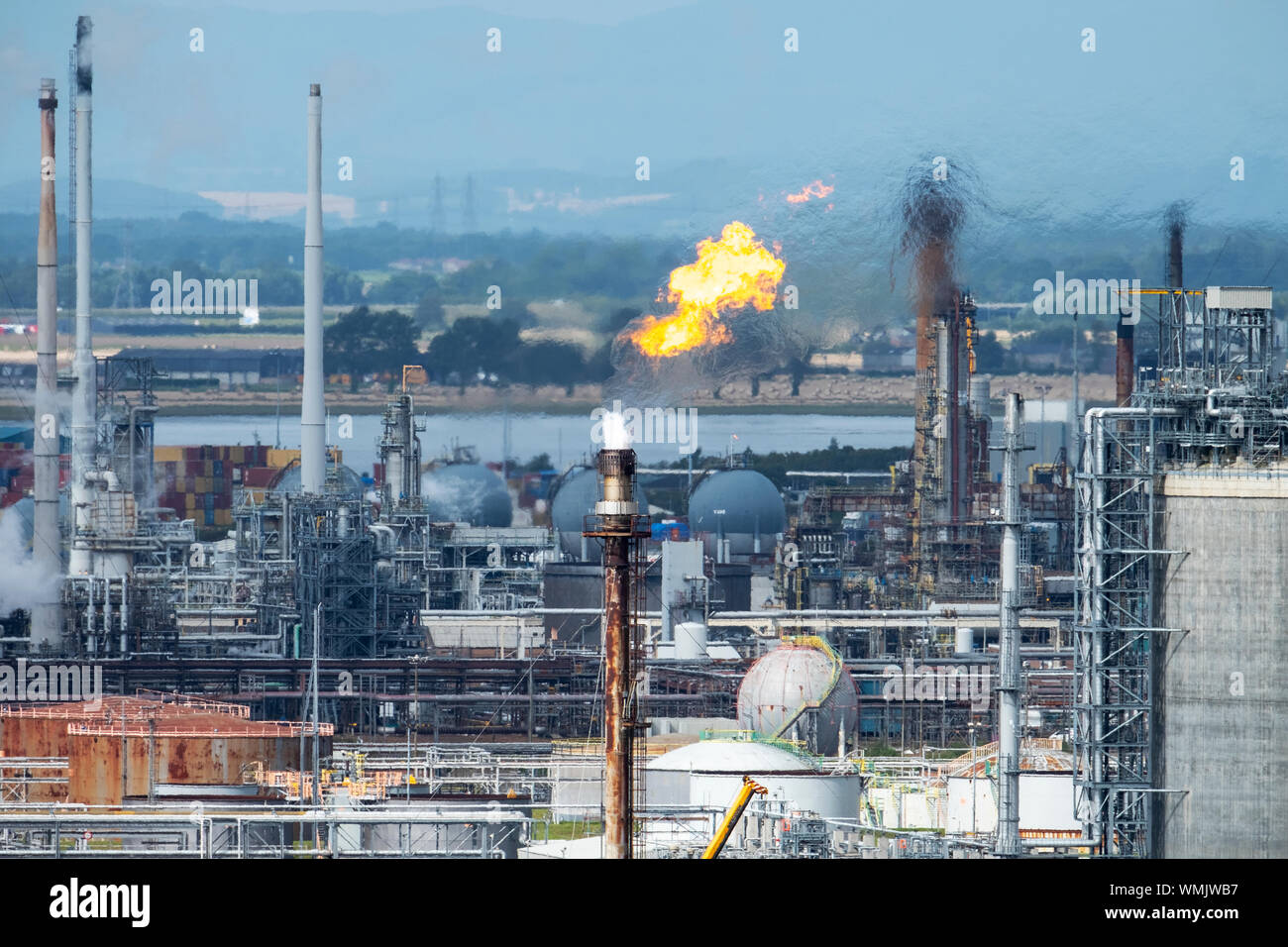 Gas flare stack burning at the Grangemouth oil refinery, Scotland Stock ...