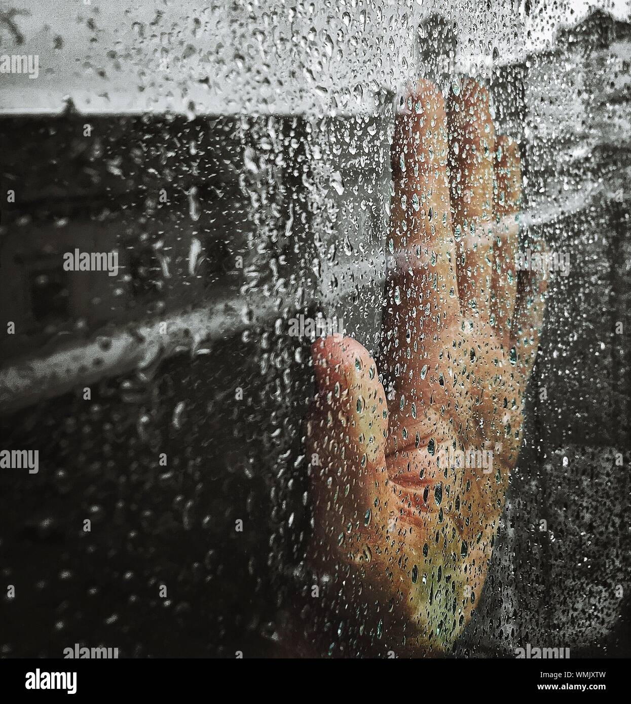 Rainy window hand hi-res stock photography and images - Alamy