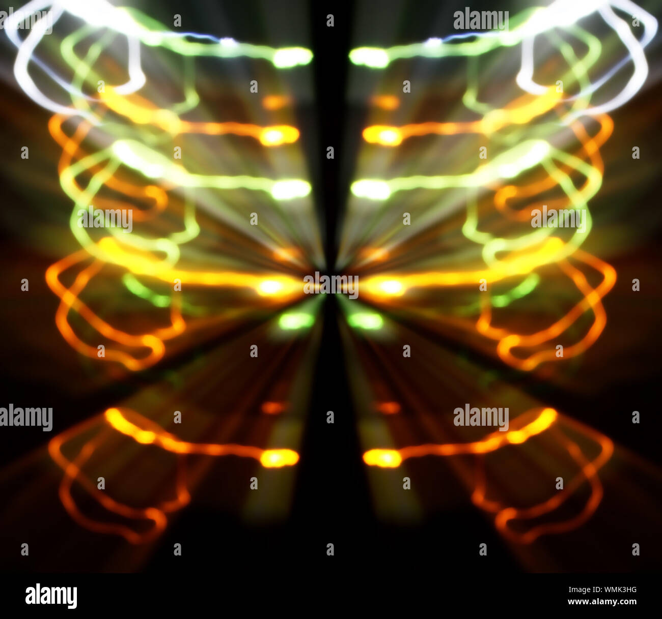 Colorful light streaks glowing on black background Stock Photo - Alamy