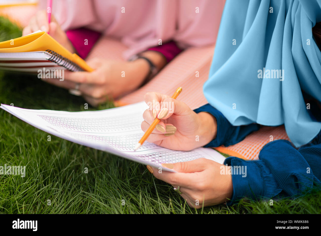 Muslim students wearing hijab speaking and studying together Stock ...