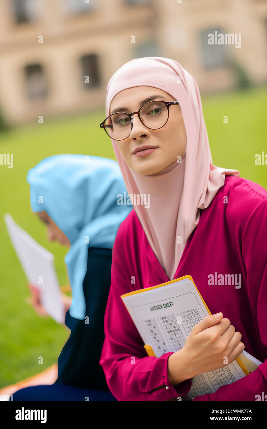 Beautiful muslim student feeling excited before lecture Stock Photo - Alamy