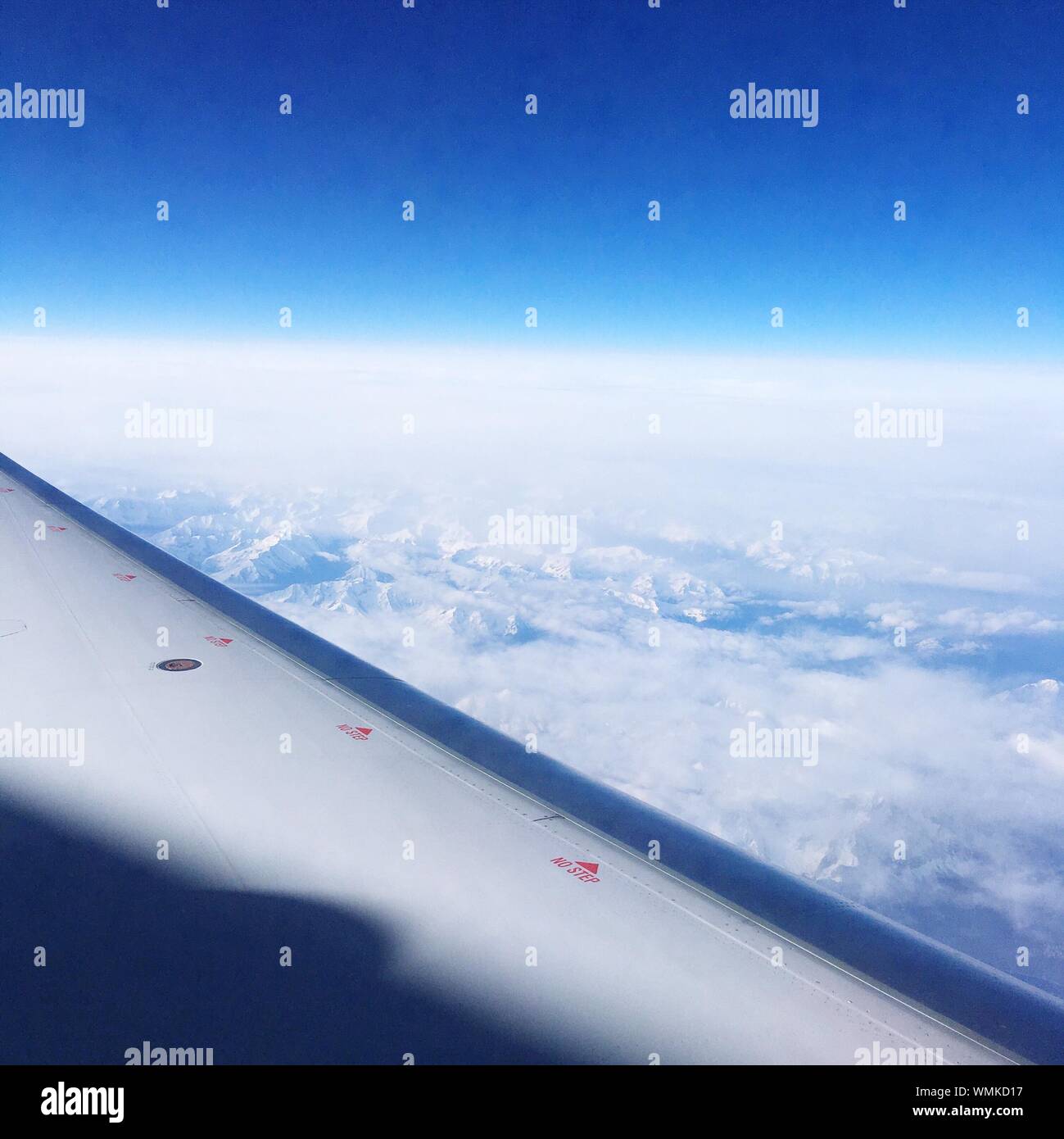 Airplane in winter sky hi-res stock photography and images - Alamy