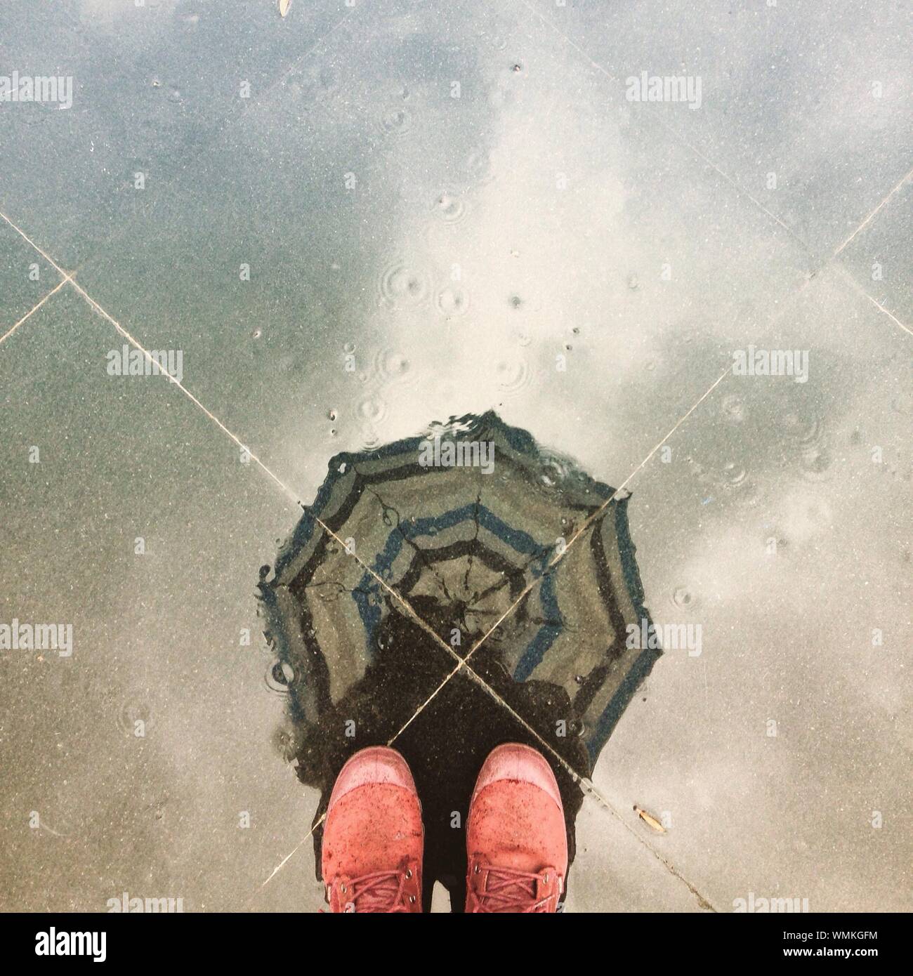 Feet in puddle hi-res stock photography and images - Alamy