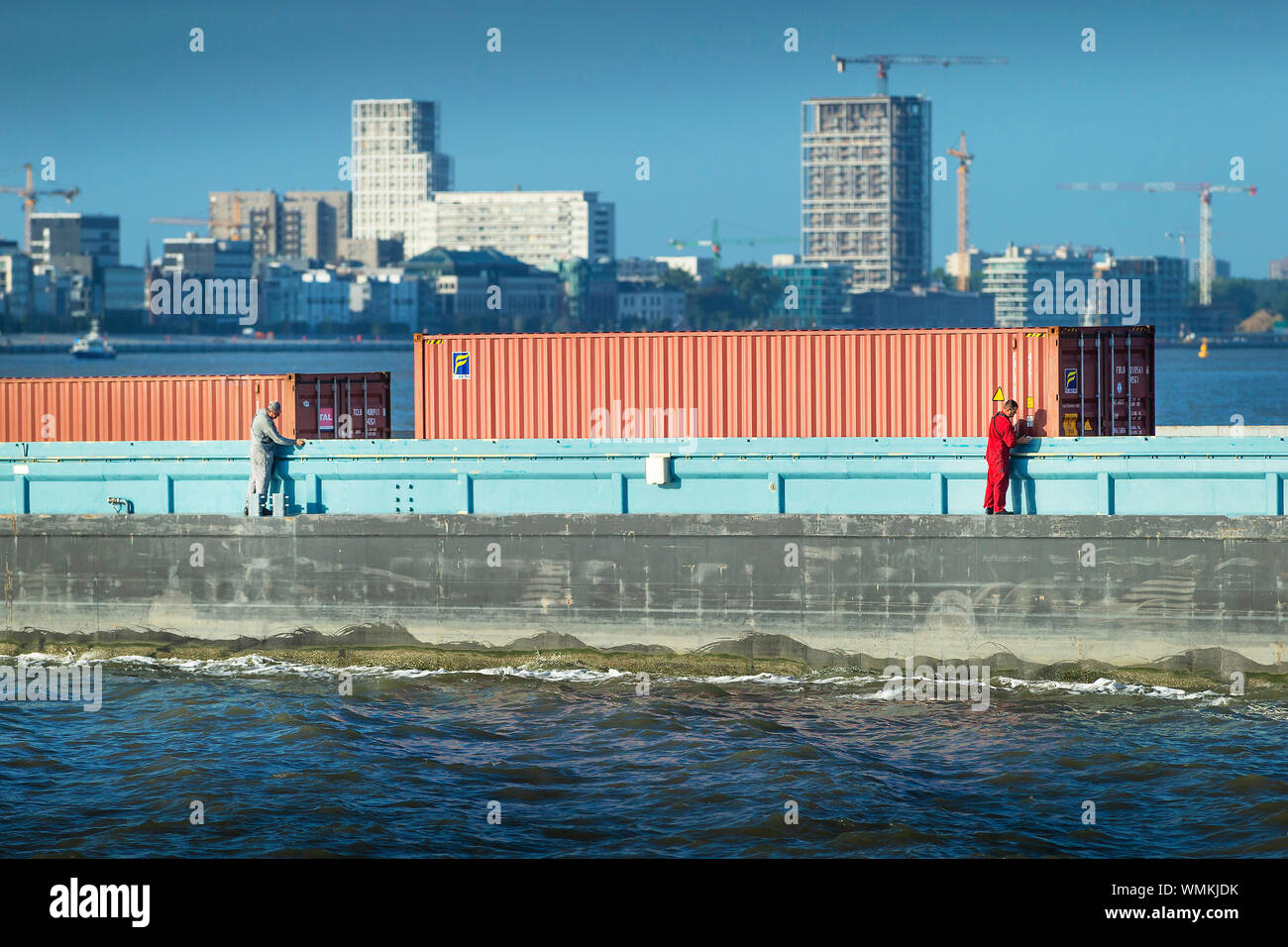 Men at work on a container ship in the harbour of Antwerp Stock Photo ...
